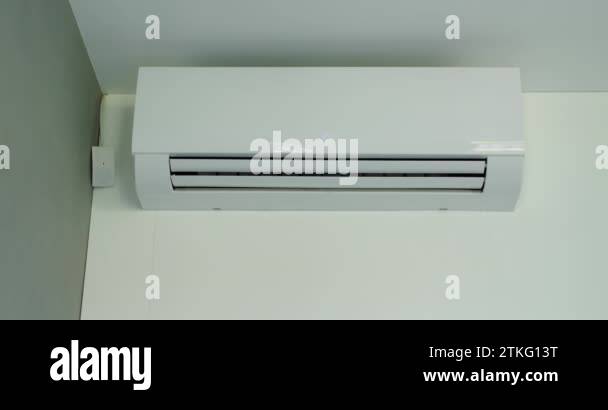 Air conditioner operation, flow louvers move up and down, distributing ...