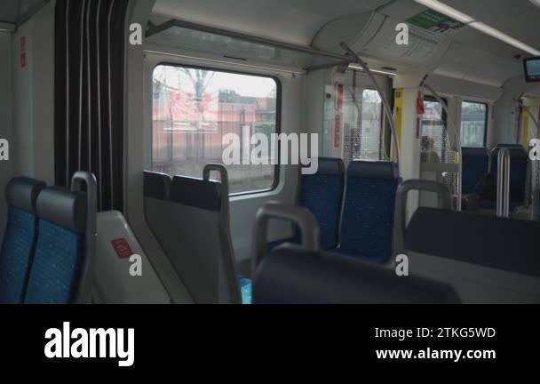Empty suburban train coach in Munich, Germany. Interior with blue seats ...