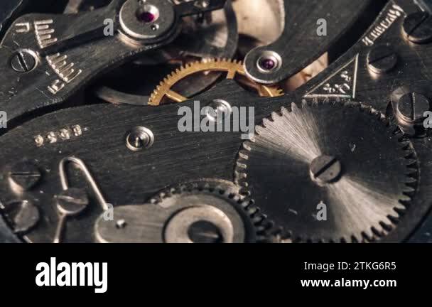 Timelapse of mechanism of vintage stopwatch with rotation close-up ...