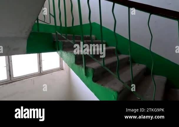 stairs in a multi-storey building. A high-rise concrete staircase ...