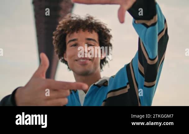 Positive student hands gesturing street portrait. Curly model ...