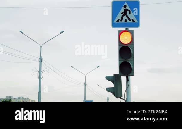 Traffic light switches from red to green Stock Video Footage - Alamy