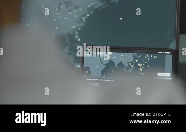 Global cyber attack with world map on computer and mobile phone screen ...