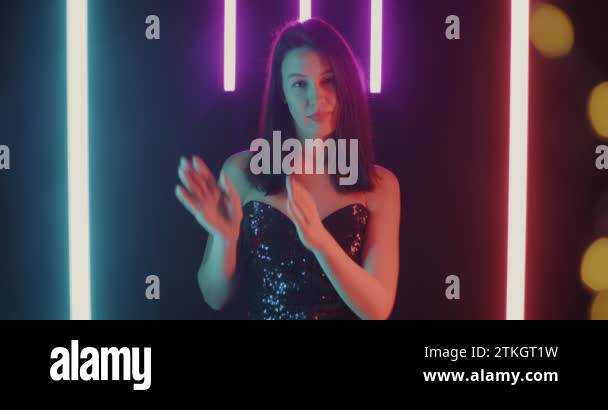 Slow motion of annoyed young woman clapping hands because of duty but ...