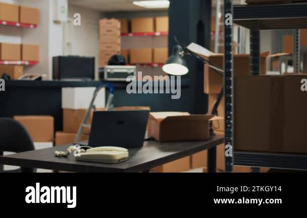 Storehouse filled with raw materials on shelves to put carton packages ...