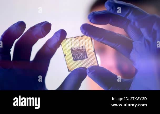 Futuristic Technology Concept: Engineer in Sterile Coverall Holds ...