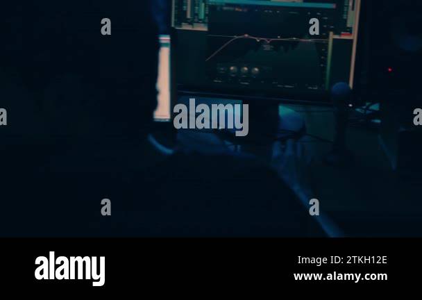 Recording studio. Sound engineer working at the computer monitor ...