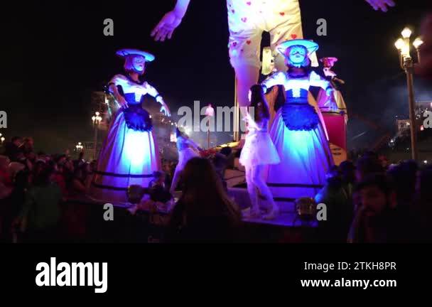 Carnival in Nice. Parade of light. Colorful images in masks. Tourists ...