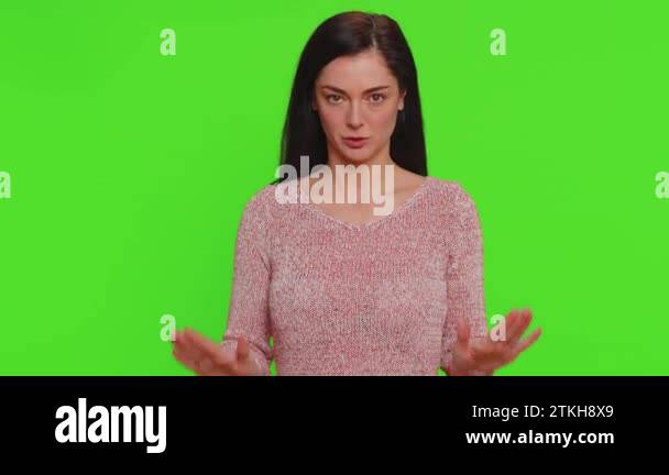 Hey you, be careful. Young woman warning with admonishing finger ...