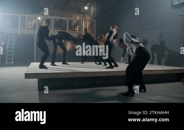 Wide shot talented actors actresses and stage director moving bodies ...