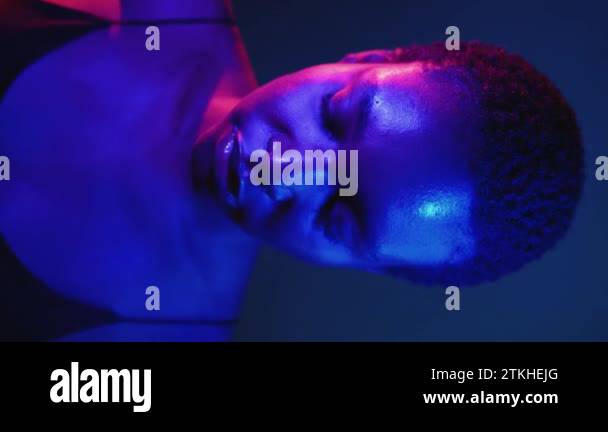 Neon light face. Feminist empowerment. Gender equality. Night portrait ...