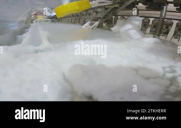 Freezing ice cream on the conveyor. Ice cream production process ...