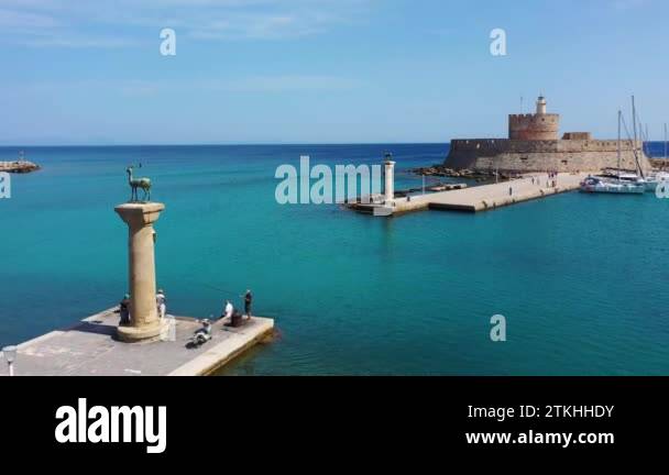 Mandraki port with deers statue, where The Colossus was standing and ...