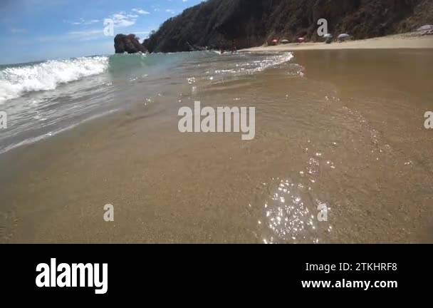 Sun drenched beach Stock Videos & Footage - HD and 4K Video Clips - Alamy