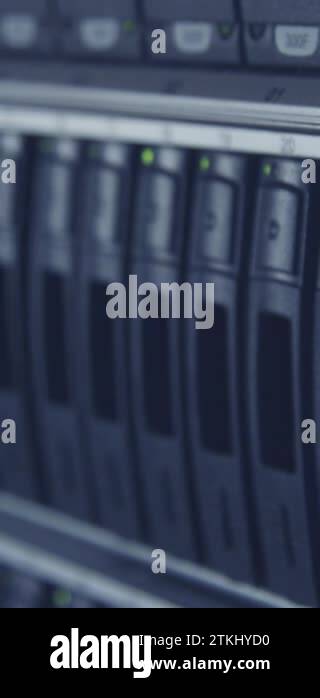 Vertical video of a large computer server room in a data center with blinking lights Stock Video ...