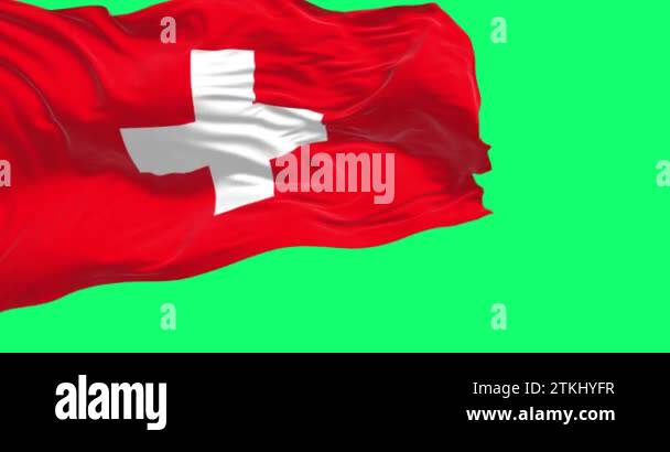 Swiss national flag waving isolated on a green background. Switzerland ...