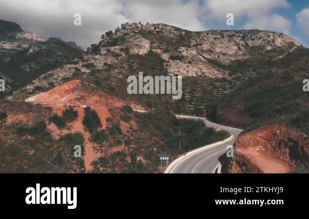 Cycling training. Cyclist riding bicycle uphill in mountains. Pro ...