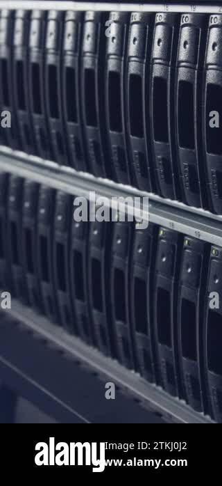 Vertical video of a large computer server room in a data center with blinking lights Stock Video ...
