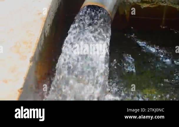 FHD footage of water coming out from tube well pipe. Concept of ...