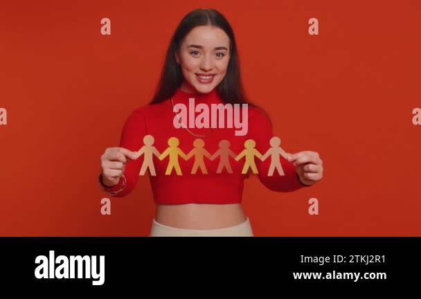 Woman showing multiracial different skin color human shape cut out of ...