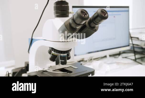 Microscopes in a modern laboratory. Working in clinic laboratory. High ...