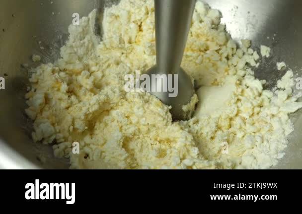 The cook interrupts the mass with homemade cottage cheese, chicken egg ...