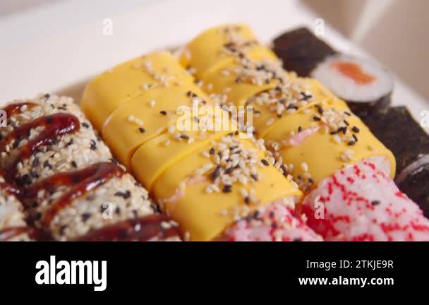 Sushi set from delivery: cheese roll, Philadelphia in sesame, tobiko ...