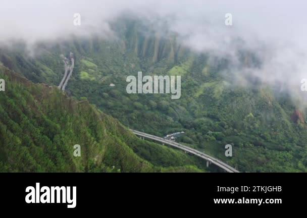 Drone flying through clouds Landmark nature views of impressive H3 road ...