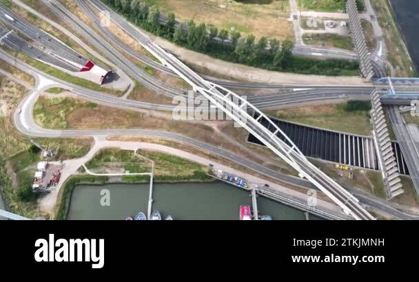 Infrastructure in the port of Rotterdam. A sluice, lock system,road ...