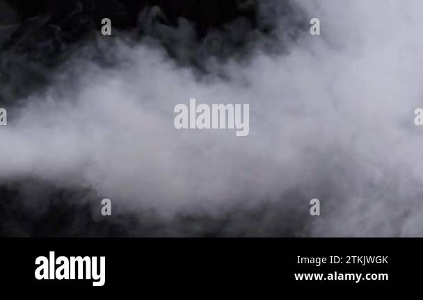 White smoke on a black background. Explosion steam. Clouds of smoke or ...