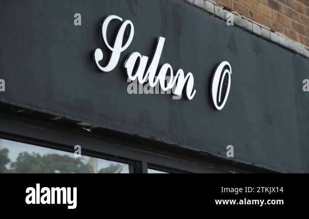 salon o franchise chain hair salon storefront sign logo, close up Stock ...