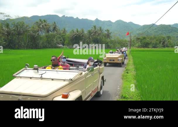 Travel experience by driving a Safari car in the open across villages ...