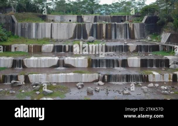 Aerial footage of the Watu Purbo sabo dam in Sleman, Indonesia which ...