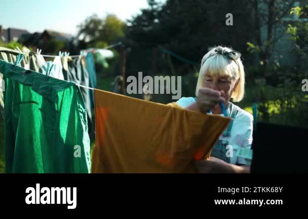 Putting clothes on washing line Stock Videos & Footage - HD and 4K ...