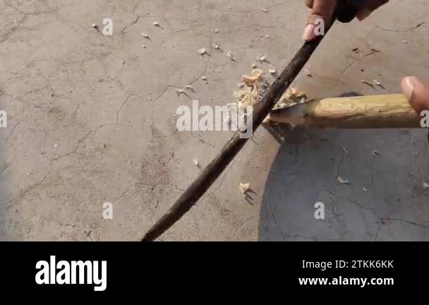 Making Gilli with desi sword. Gilli Danda (also spelled Gulli-Danda ...