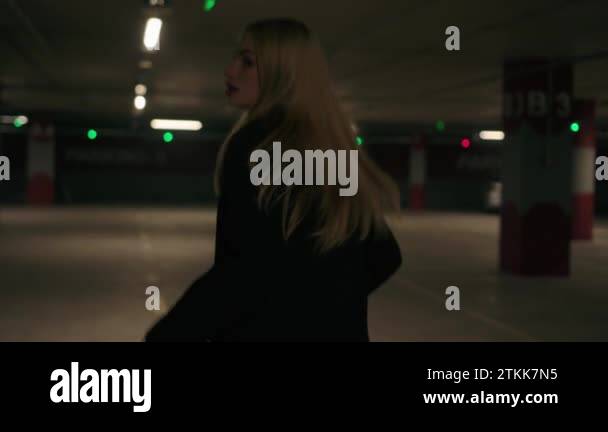 Frightened lonely woman behind view scared walking girl running alone ...