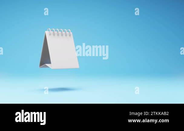 Orange and White Single Day Desk Calendar Spinning on a Studio Blue ...