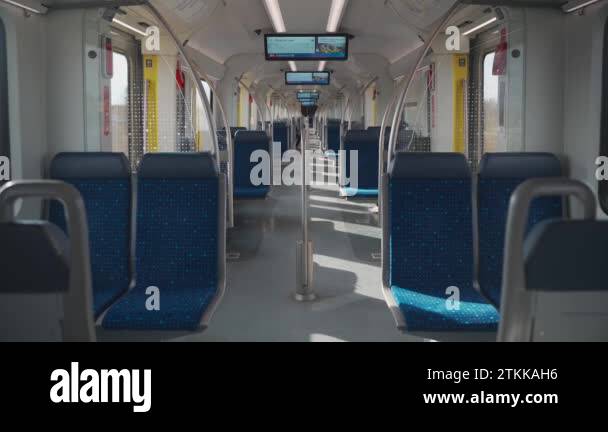 Empty suburban train coach in Munich, Germany. Interior with blue seats ...