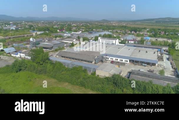 Modern factory top view. A flight over a new modern furniture factory ...