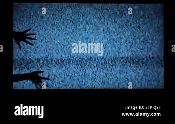 Hands on the background of the noise of the TV scary scene for a horror ...