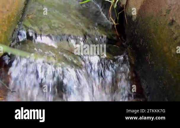 FHD footage of water coming out from tube well pipe. Concept of ...