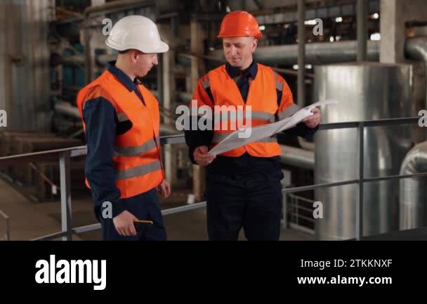 Engineer reviewing, Drawing inspection, Project visualization. In ...