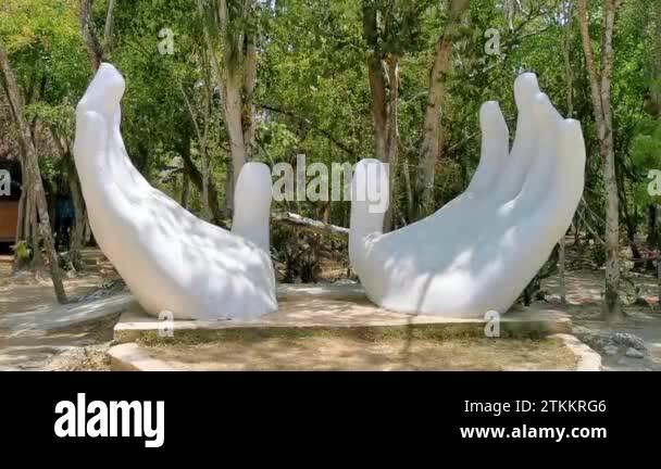 Tulum Quintana Roo Mexico 02. May 2023 White hands sculpture figure ...