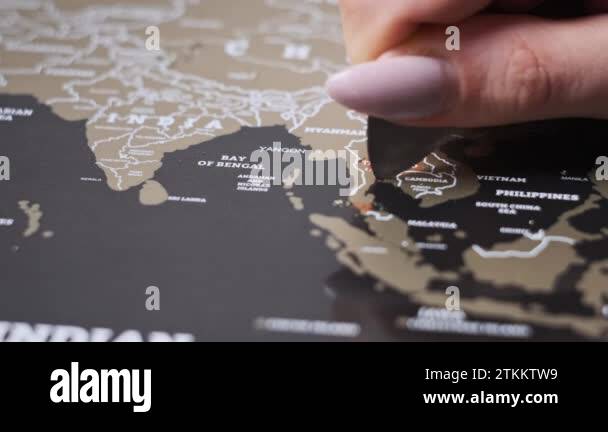 Scratching Thailand Country on the Surface of Scratch World Map. Woman ...