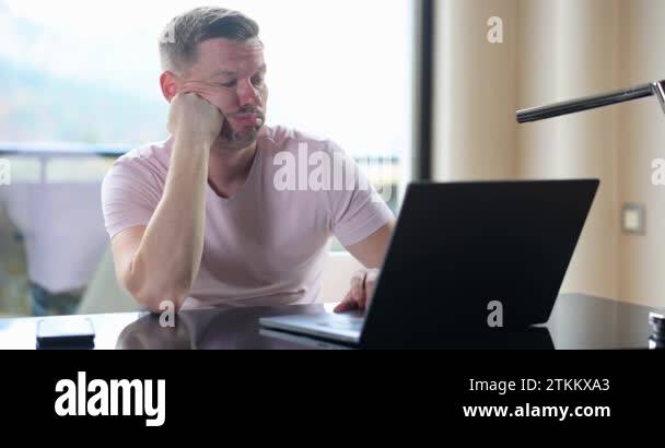 Looking at computer screen sad Stock Videos & Footage - HD and 4K Video ...