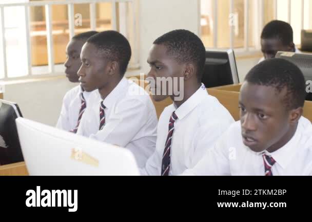 27th August 2023, Abuja Nigeria: Africa Nigeria student sitting in front of computer, taking ...