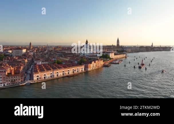 Venice from the sky, showcasing Basilica, Grand Canal, Punta della ...