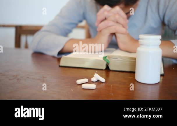 A woman, seeking detox and salvation from drugs and alcohol, fervently ...