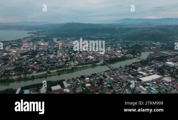 Top view of villages in riverside and highway in Cagayan de Oro ...
