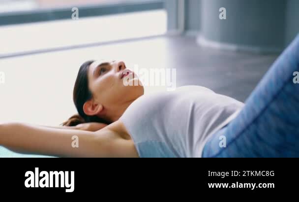 Woman, exercise and sit up on floor for fitness, abdomen muscle and ...